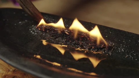 Qulleq, traditional inuit oil lamp. | Stock Video | Pond5