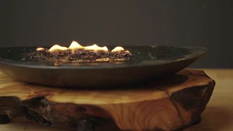 Qulleq, traditional inuit oil lamp. | Stock Video | Pond5