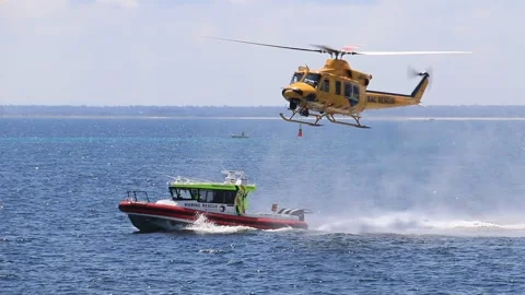 RAC Rescue Helicopter Lifting Up And Awa... | Stock Video | Pond5