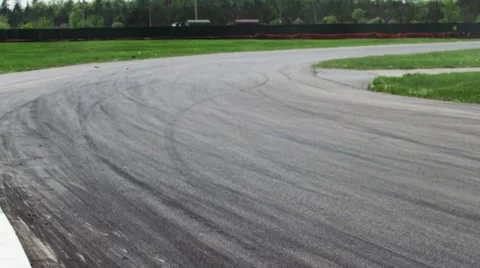 Race cars drifting on a track at a motor... | Stock Video | Pond5