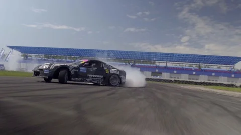 Race Cars Drifting On A Track At A Motor... | Stock Video | Pond5