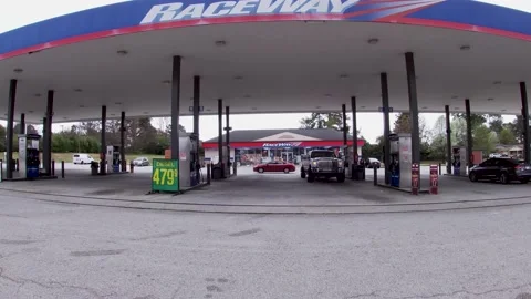 RaceWay retail gas station and few peopl... | Stock Video | Pond5