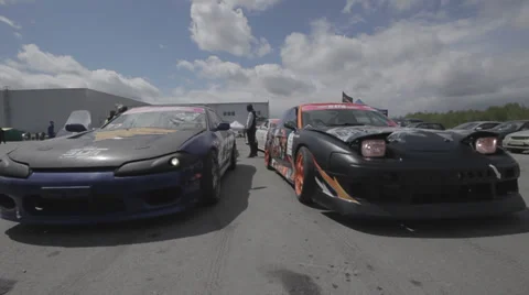 Racing car on the parking - filmed with ... | Stock Video | Pond5