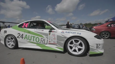 Racing car on the parking - filmed with ... | Stock Video | Pond5