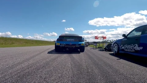 Racing car starting a test round on a cl... | Stock Video | Pond5