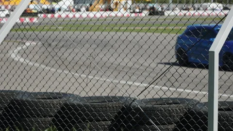 Racing track fencing made of metal mesh ... | Stock Video | Pond5