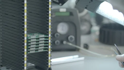 A rack of circuit boards at the inspecti... | Stock Video | Pond5