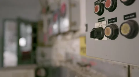 Rack focus from a control panel to an op... | Stock Video | Pond5