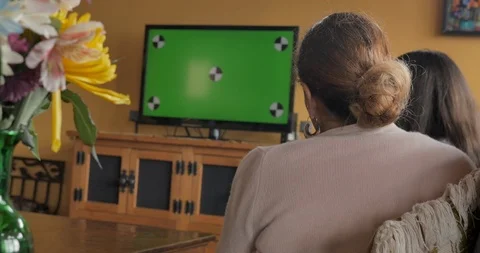 Rack focus from mom and teen daughter to... | Stock Video | Pond5