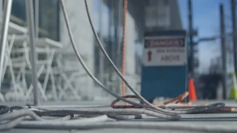 Rack focus of safety ropes and warning s... | Stock Video | Pond5
