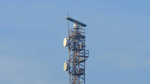 Radar Tower Beacon against a blue sky on... | Stock Video | Pond5