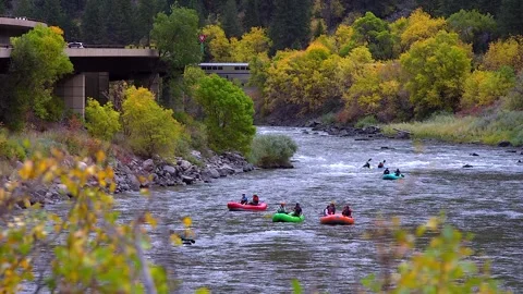Rafters Float Mountain River In Fall | Stock Video | Pond5