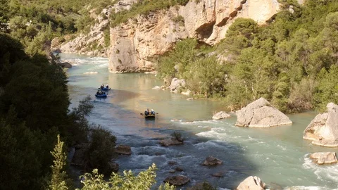 Rafting boats floating down calm river i... | Stock Video | Pond5