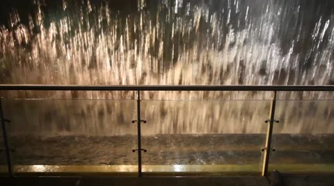 railing and artificial waterfall with il... | Stock Video | Pond5