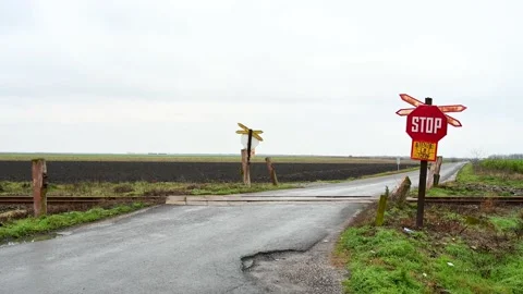 Railway crossing in the field. Crossbuck... | Stock Video | Pond5