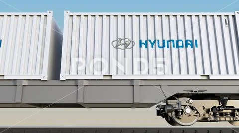 Railway transportation of containers with Hyundai Motor Company logo ...