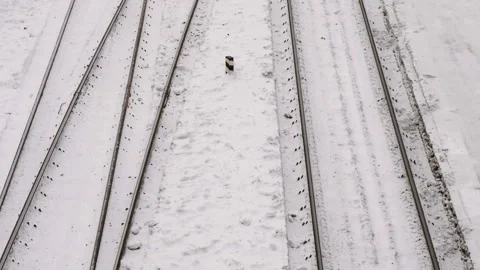 Railways in snow, top view, camera move ... | Stock Video | Pond5