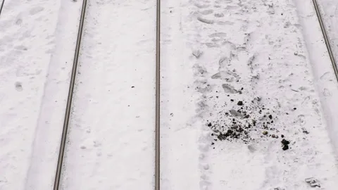 Railways in snow, top view, camera move ... | Stock Video | Pond5