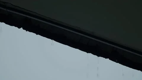 Rain and roof. Falling rain from the roo... | Stock Video | Pond5
