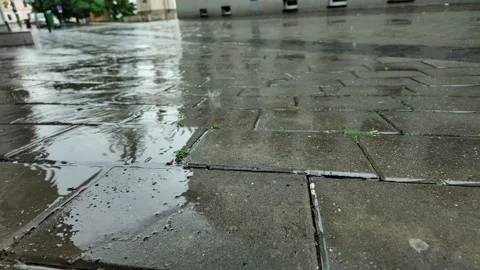 Rain in the city. View of raindrops fall... | Stock Video | Pond5