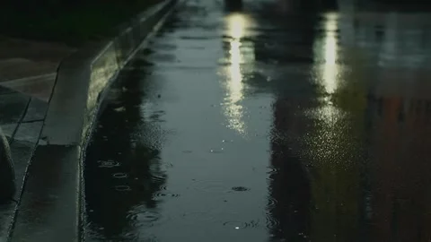 Rain Drops On Puddle Stock Footage ~ Royalty Free Stock Videos | Pond5