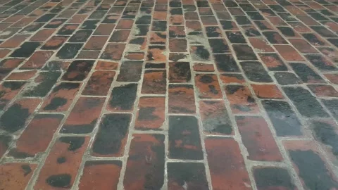 Rain Drops Falling on a Brick Floor | Stock Video | Pond5
