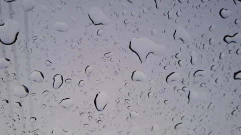 Rain Drops Falling down on background mi... | Stock Video | Pond5