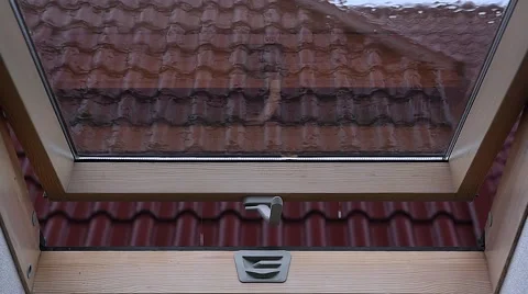 rain drops falling on glass roof window | Stock Video | Pond5