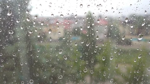 Rain drops on the moving overwrap tent | Stock Video | Pond5