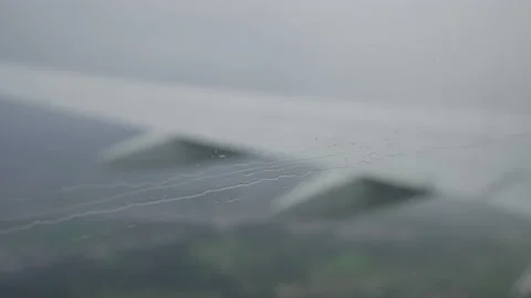 Rain Drops on Passenger Airplane Window,... | Stock Video | Pond5