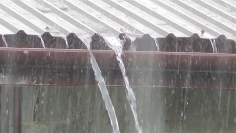 Rain Pouring From Roof | Stock Video | Pond5