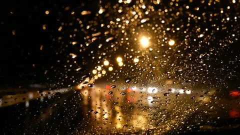 rain running down on front car window at... | Stock Video | Pond5