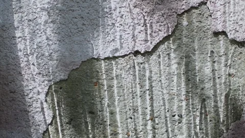 Rain shadow on peeling plaster as a back... | Stock Video | Pond5