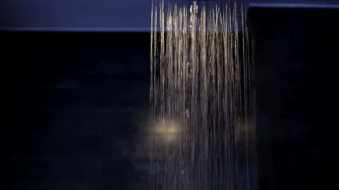 Rain shower water flow down in dark bla... | Stock Video | Pond5