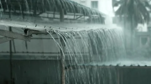 Rain on a Tin Roof. Rain Falling from th... | Stock Video | Pond5