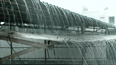 Rain on a Tin Roof. Rain Falling from th... | Stock Video | Pond5