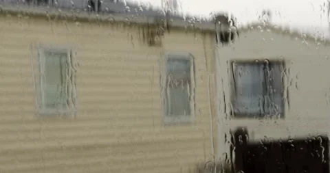 Rain on a UK static caravan window, with... | Stock Video | Pond5