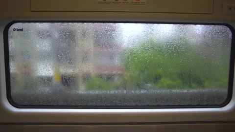 rain view from metro train window in mum... | Stock Video | Pond5