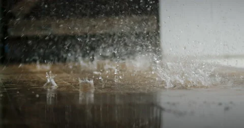 Rain water drop falling to the floor. | Stock Video | Pond5