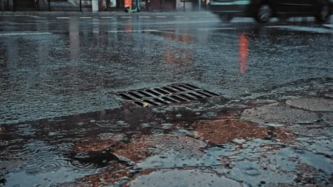 Rain Storm Drain Cover Stock Footage ~ Royalty Free Stock Videos | Pond5
