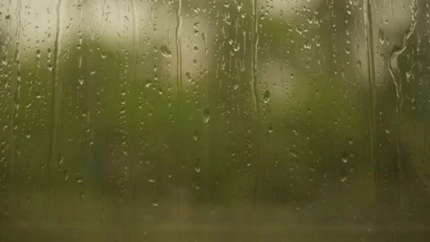 Rain Water on Warm Tinted Window India M... | Stock Video | Pond5