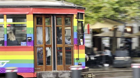 Rainbow coloured tram in city of Milan. ... | Stock Video | Pond5
