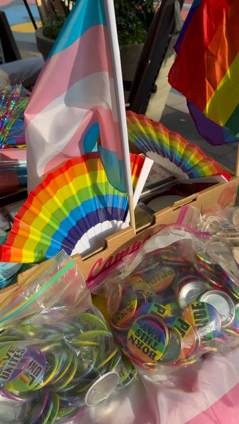 Rainbow flags are on sale on the street ... | Stock Video | Pond5