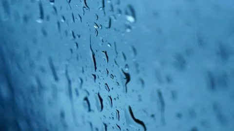 Raindrop on window blue background aqua ... | Stock Video | Pond5