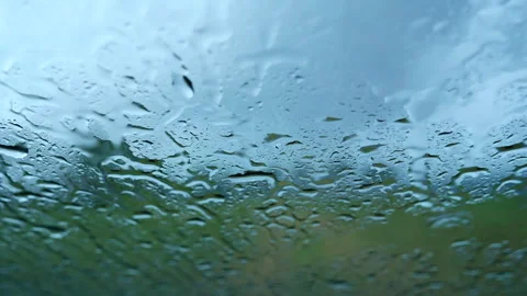 Raindrop on window blue background aqua ... | Stock Video | Pond5