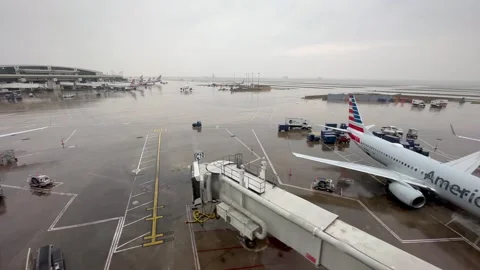 Raint Day Airport Tarmac and Planes | Stock Video | Pond5