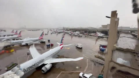 Raint Day Airport Tarmac and Planes | Stock Video | Pond5