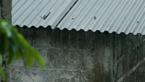 Rainwater splashes that fall on asbestos... | Stock Video | Pond5