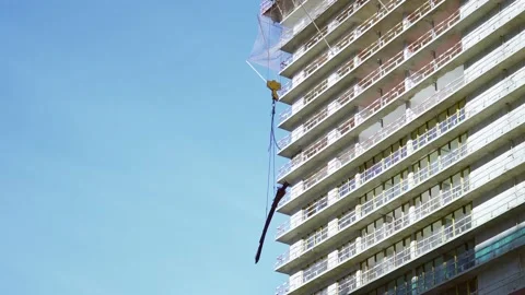 Raise the building load to a height. Cra... | Stock Video | Pond5