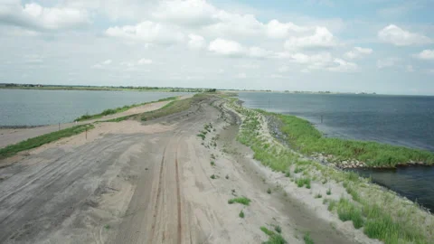Raised levee dike for sea level rise ada... | Stock Video | Pond5